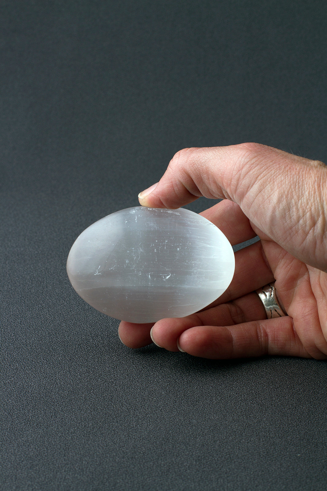 Selenite Palm Stone – Silver Eagle Gallery